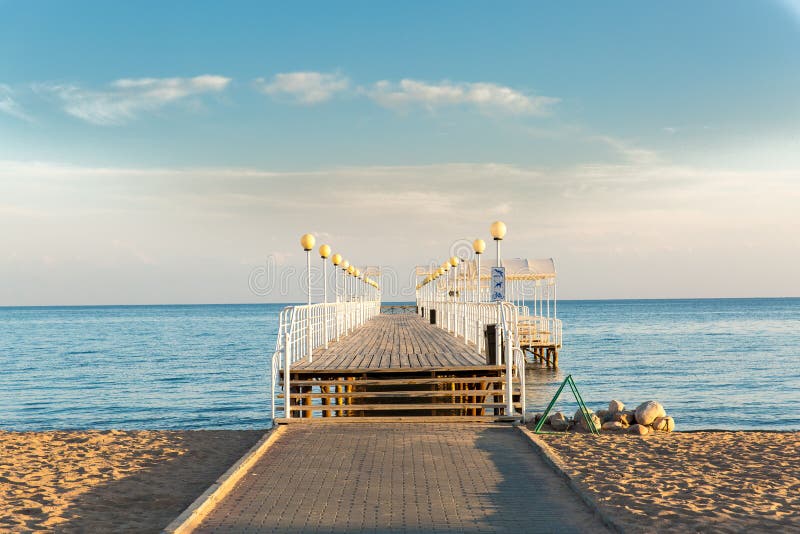 Beach at sea with pier stock photo. Image of summer, destination - 69402904