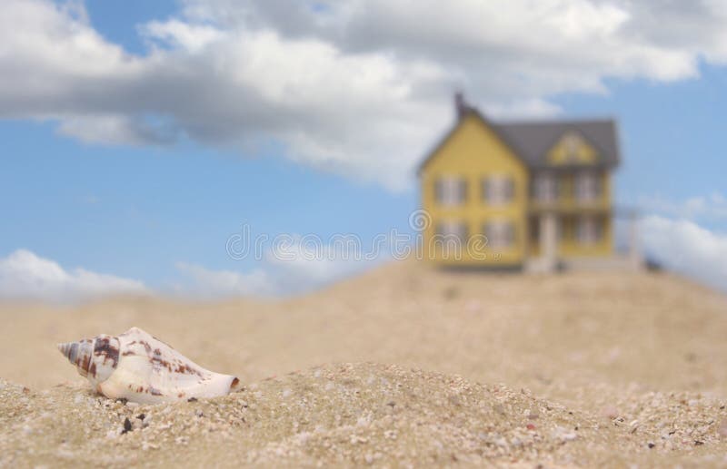 Beach Sea Shell and Beach House, Shallow DOF Stock Image - Image of ...