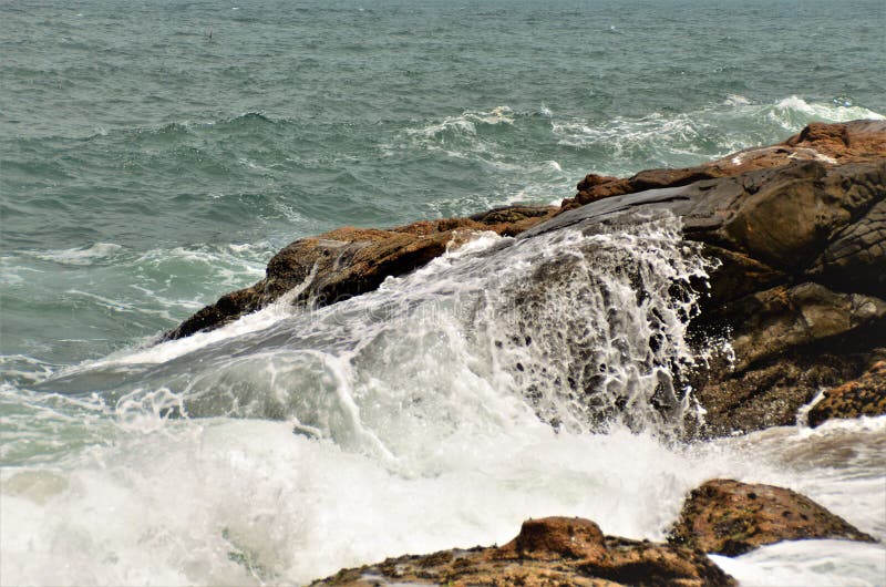 The Wave Hitting the Rocks on the Beach Stock Image - Image of rocks ...
