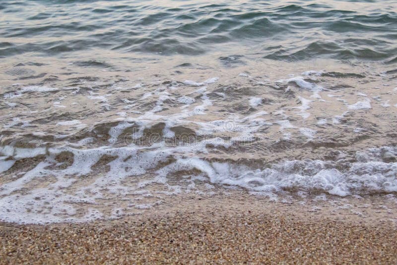 The Beach with Sea Waves Running on the Sand. Beautiful View on the ...