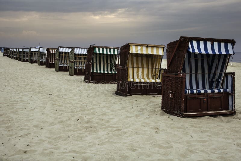 Beach seats stock image. Image of horizontal, line, sand - 32746433