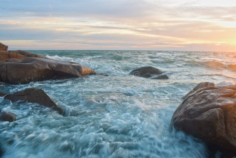 At the Beach during the Setting Sun the Wind Blows Cool. Beautiful ...