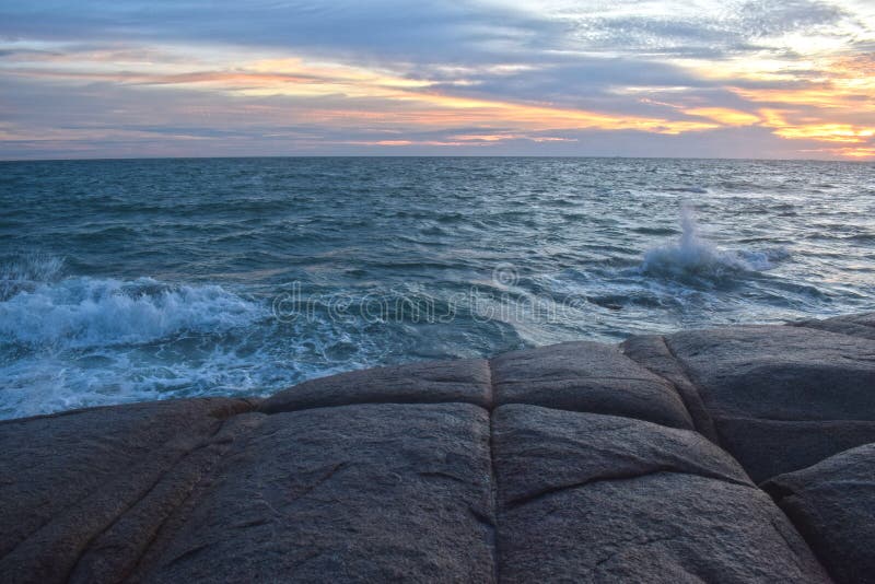 At the Beach during the Setting Sun the Wind Blows Cool. Beautiful ...