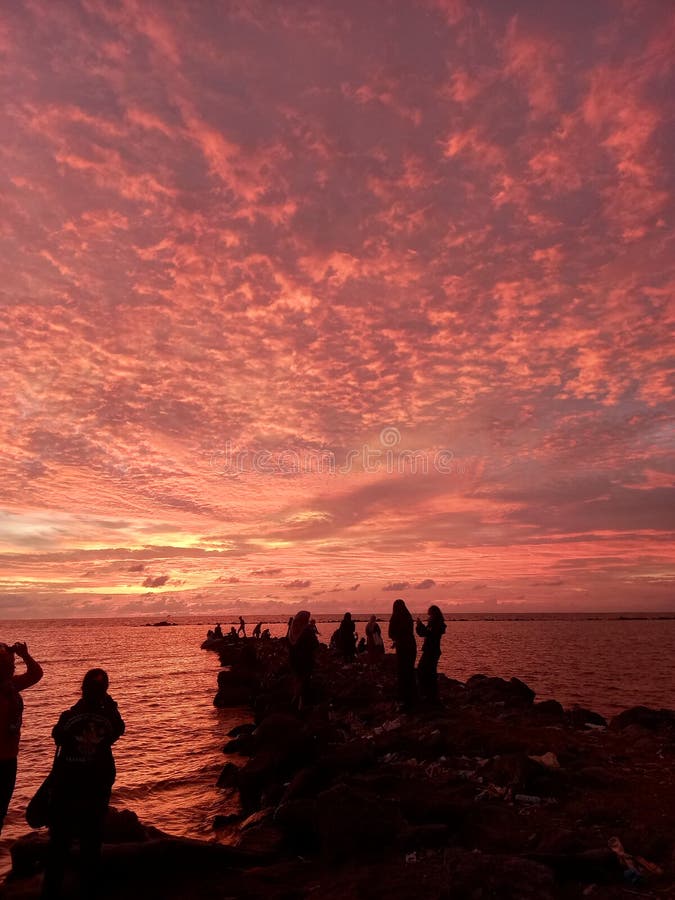 Beach Shadow Peoples Rocks Sea View Sky Sunset Reflection Stock Photo ...