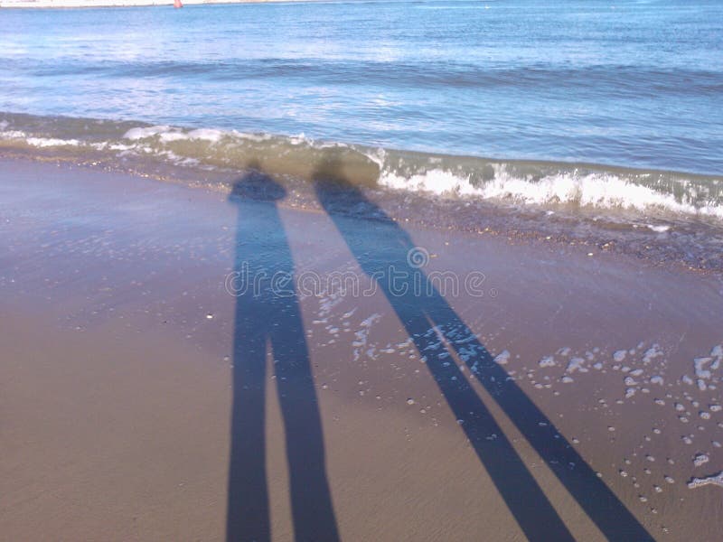 Beach shadows stock photo. Image of sand, shadows, beach - 66417084