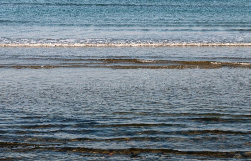 Beach with Shallow Water and Small Waves. Stock Image - Image of coast ...