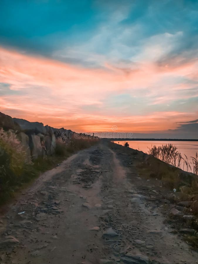 Beach side river road stock photo. Image of horizon - 207555362