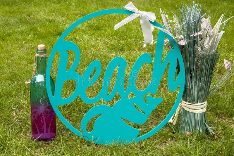 Beach stock image. Image of grass, shell, seashore, sign - 92549929