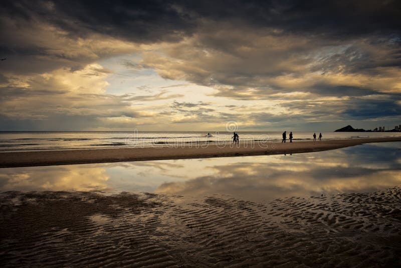 Beach & Sky reflection stock image. Image of golden - 48368461