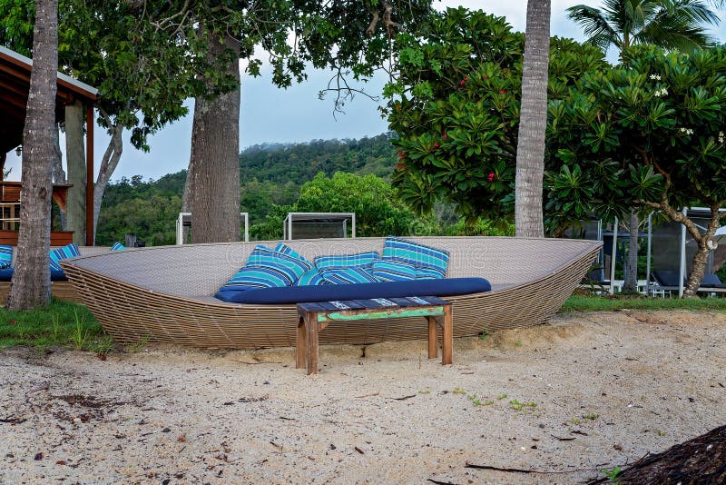 Beach Sofa on the Sand stock image. Image of pillows - 175251183