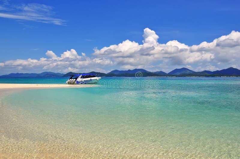 Beach with speedboat stock image. Image of nautical, speedboat - 51473127