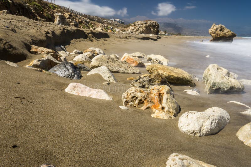 Beach and stones stock image. Image of island, crete - 99910259
