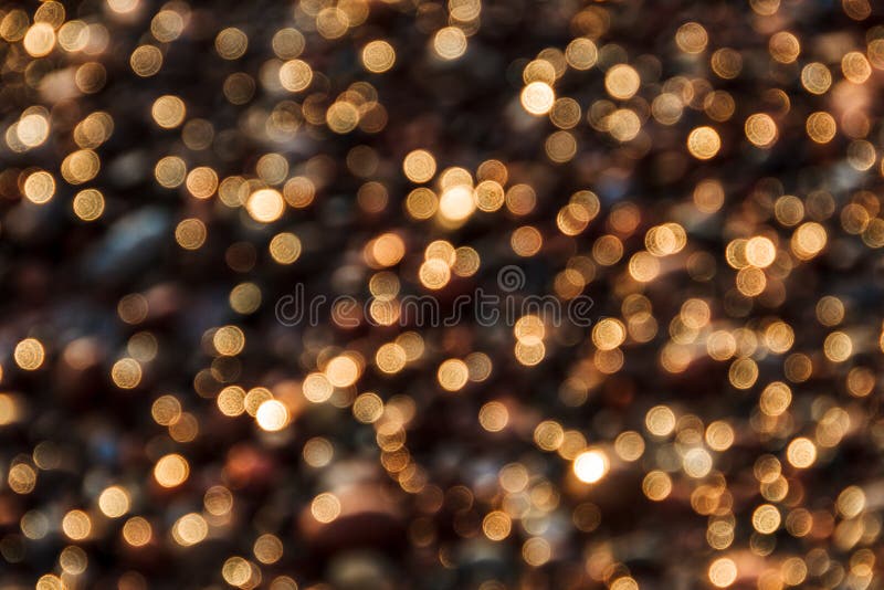Beach stones bokeh stock image. Image of light, patterns - 91658281