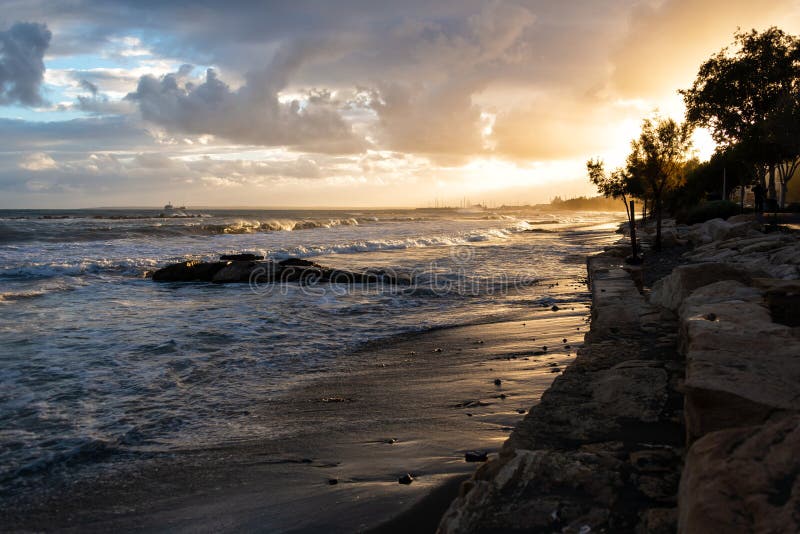 Beach during a Stormy Weather at Sunset in Limassol. Cyprus Stock Image ...
