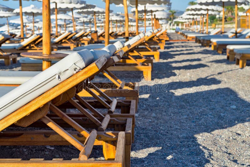 Beach sunbeds closeup stock image. Image of sand, morning - 96337809
