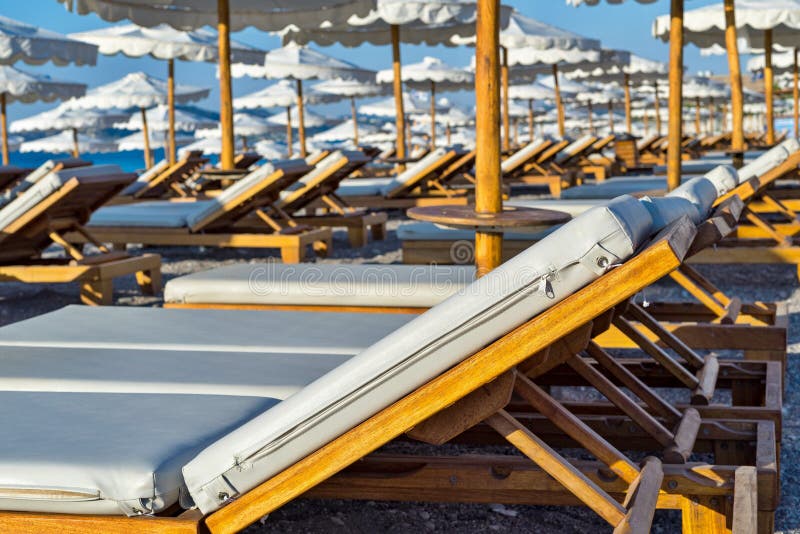 Beach sunbeds closeup stock image. Image of sand, morning - 96338069