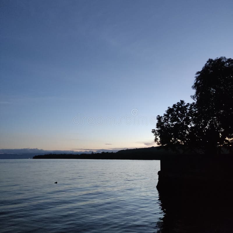 The beach when sunrise stock photo. Image of shadow - 260709960