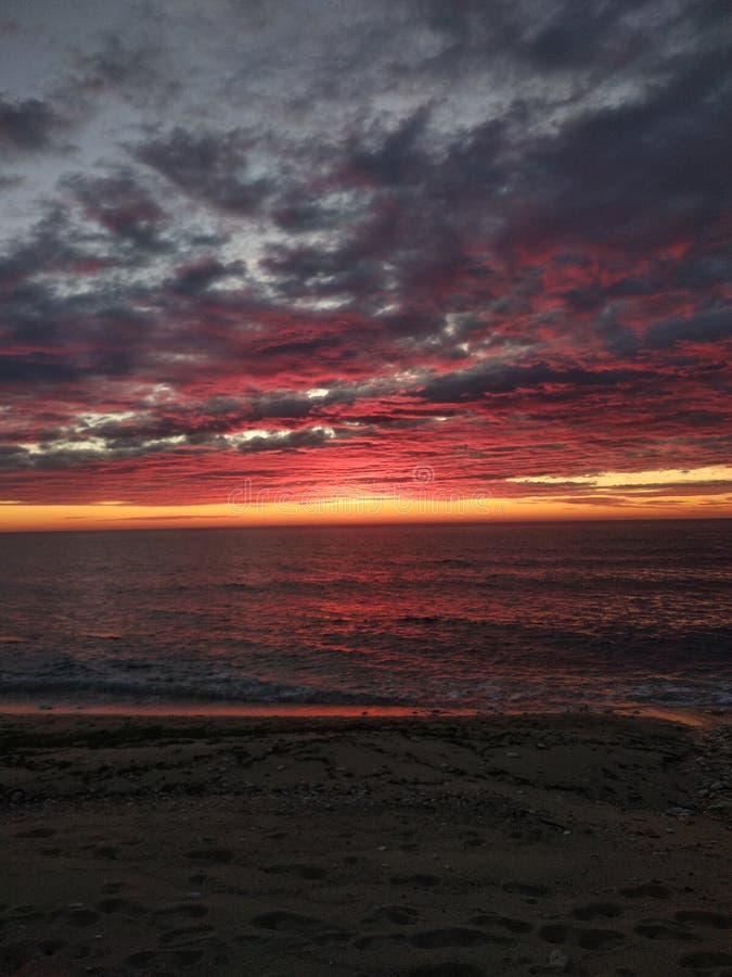 Beach and sunrise stock image. Image of sunrise, evening - 183110555