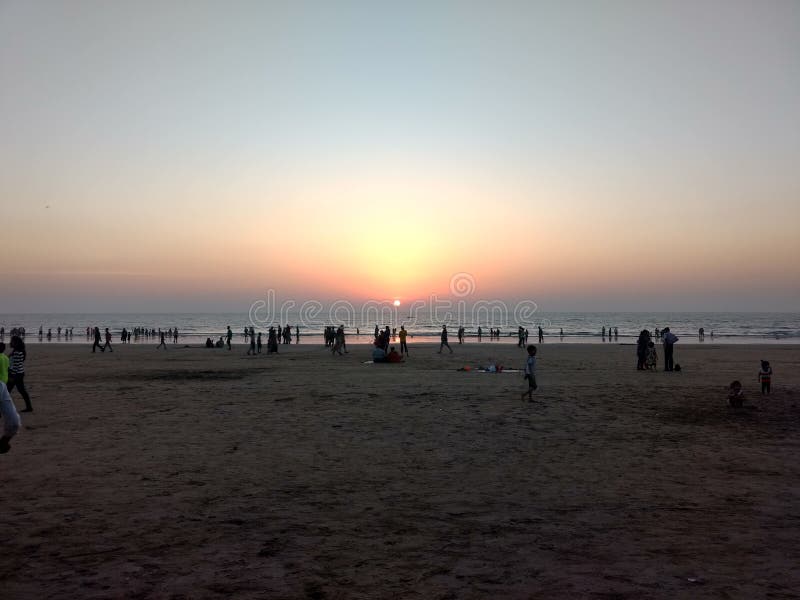 Beach and sunset editorial image. Image of sand, busy - 105015180