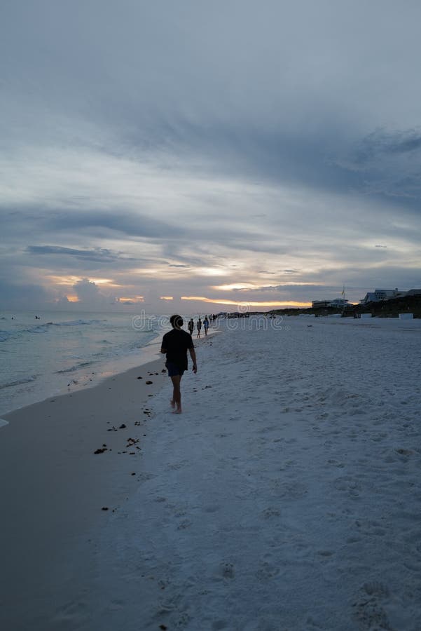 Beach during Sunset with People Resting on the Beach Stock Image ...