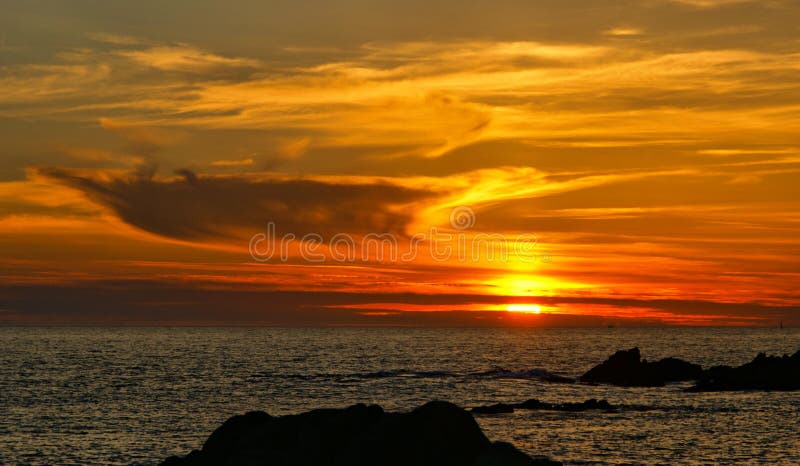 Beach sunset in Portugal stock image. Image of skyline - 127401939