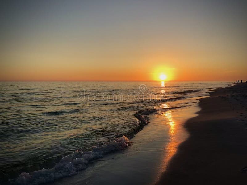 Beach sunset stock photo. Image of water, ocean, evening - 303434870