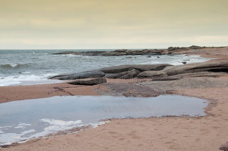 Beach at sunset in uruguay stock photo. Image of ocean - 248083130