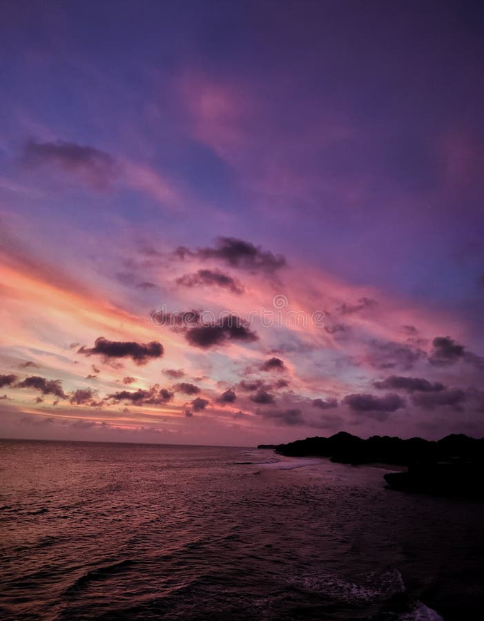 Beach sunset stock image. Image of coast, morning, wave - 261809255