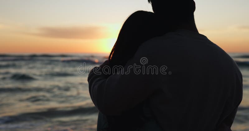 Beach Sunset View And Relax Couple Silhouette Hug And Bond On