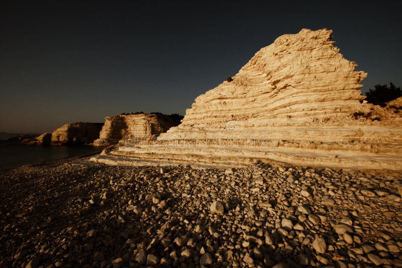 Beach in Syria stock image. Image of water, cliff, cave - 13808237