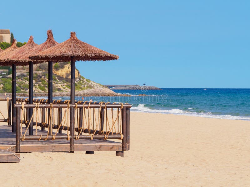 Beach terrace and rocks stock photo. Image of sand, summer - 90149632