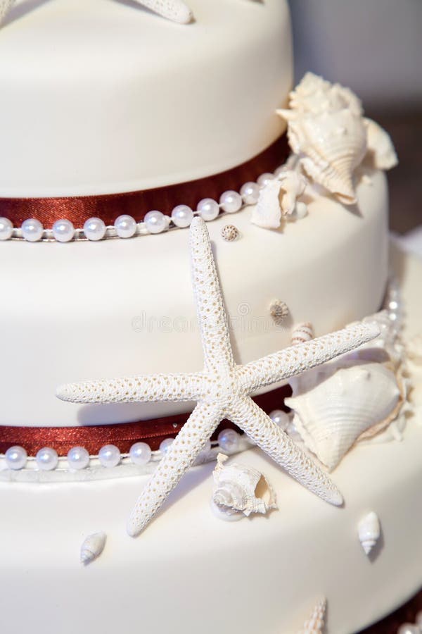Beach Theme Wedding Cake with Starfish and Shells Stock Image - Image ...