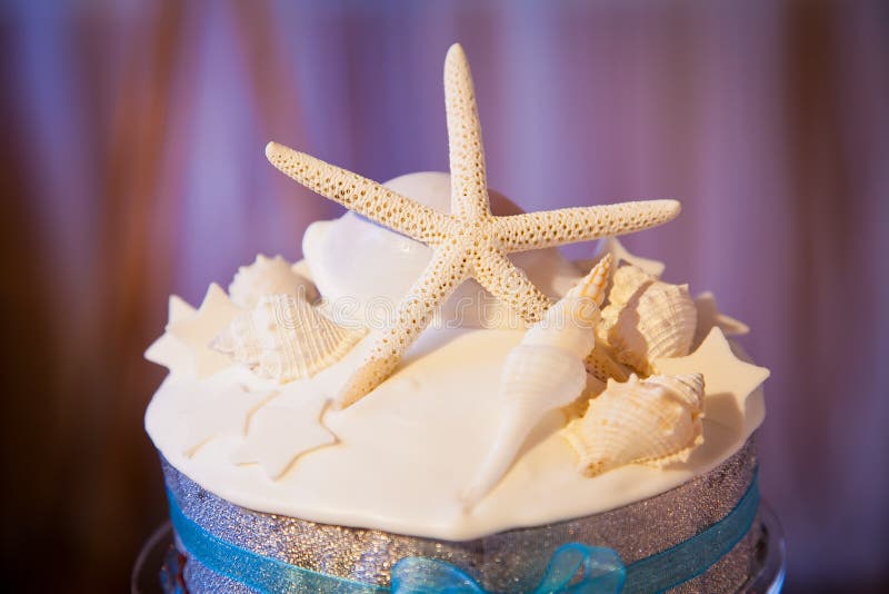 Beach Theme Wedding Cake with Starfish and Shells Stock Photo - Image ...