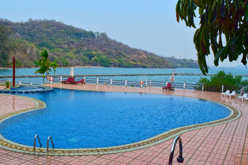 At the Beach There is a Beautiful Seaside Pool and a View Stock Image ...