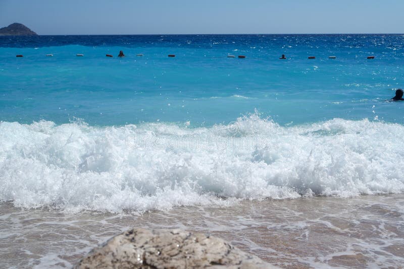 Slight Wavy Sea on the Beach Stock Photo - Image of sunrise, outdoors ...