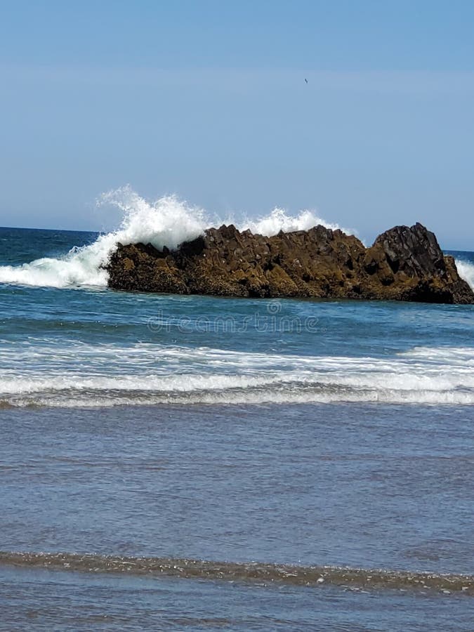 Beach time water battle stock photo. Image of wall, beach - 268823390