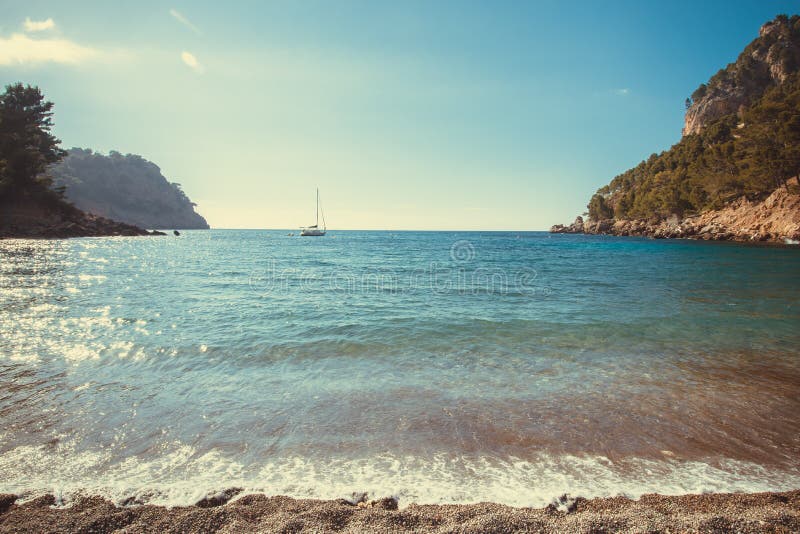 Beach with Turquoise Water and Rocks Stock Photo - Image of tourism ...
