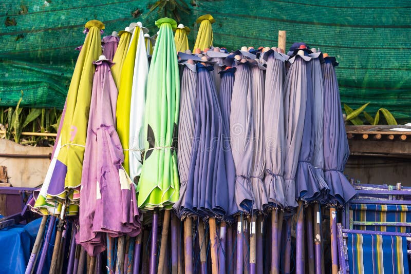 .Beach Umbrellas Closed Placed Together Against the Wall.Thailand Stock ...