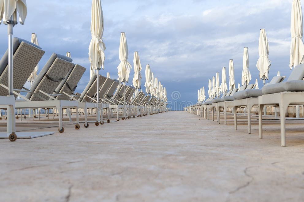 Beach umbrellas stock photo. Image of lifestyle, landscape - 322357948
