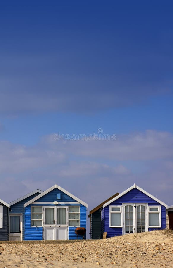 Storage Sheds on the Beach stock image. Image of blue - 1875777