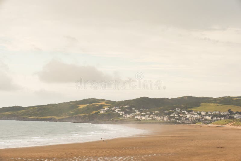 Beach View Across the Sand with Sea Shore and Seaside Town Stock Photo ...