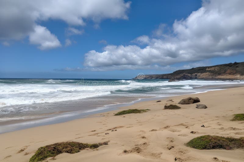 Beach with View of Blue Sky and White Clouds, and Waves Rolling Onto ...