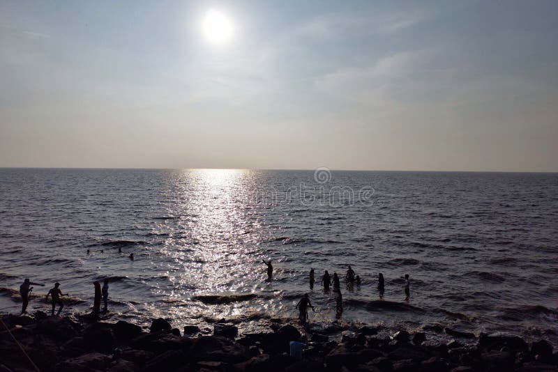 Beach View with People are Swimming and Bathing in Water Stock Photo ...