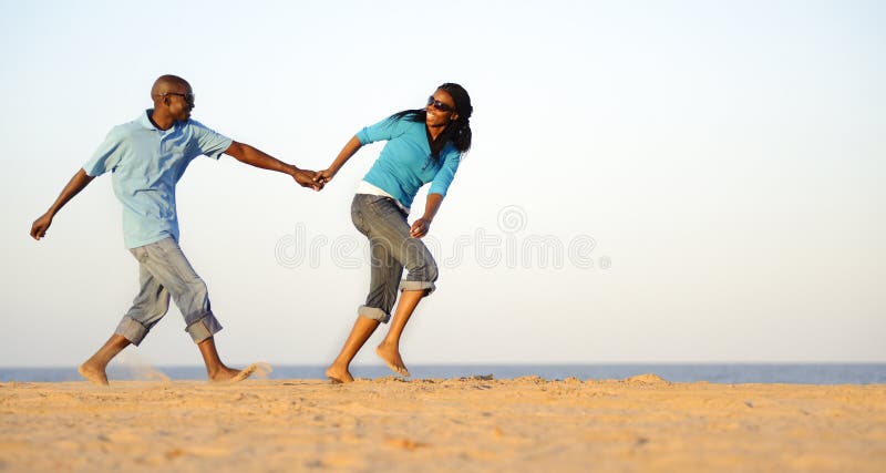 Beach walk stock photo. Image of boyfriend, black, young - 14908054