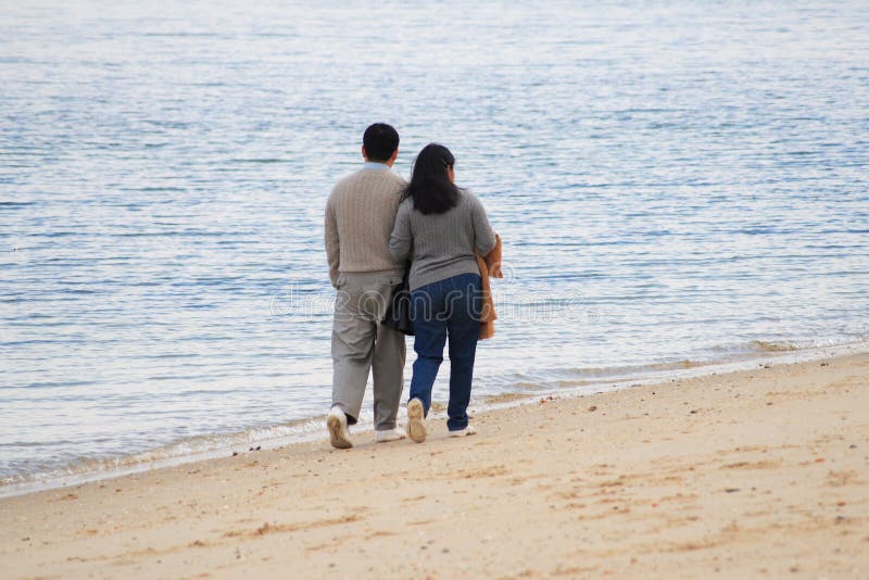 Beach Walk stock image. Image of adult, stroll, beach - 1500649