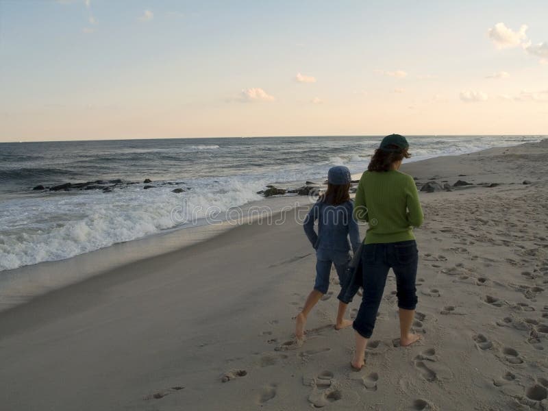 Beach Walk stock image. Image of girls, horizon, sunset - 2134899