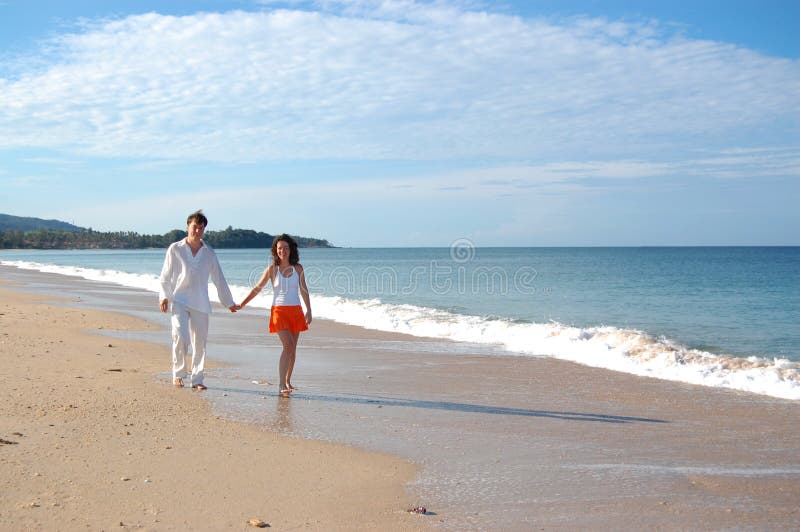 Beach walk stock image. Image of bonding, couple, carefree - 9197429