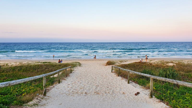 Beach Walk at Sunset stock photo. Image of beach, australia - 258909988
