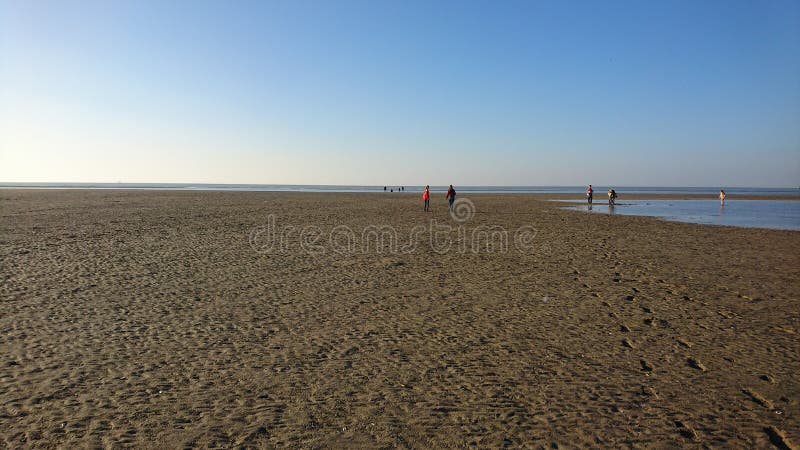 Beach stock photo. Image of water, beach, cold, people - 160934706