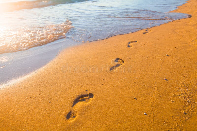 Beach, Wave and Footprints at Sunset Time Stock Photo - Image of mark ...